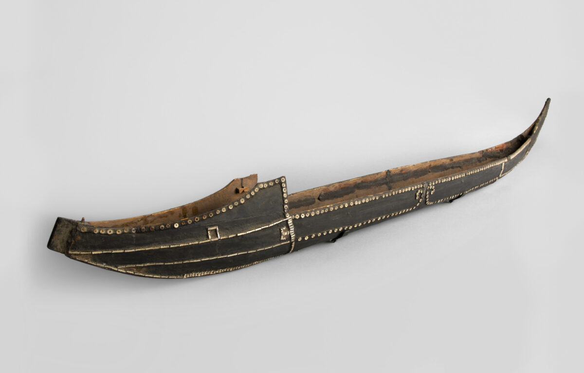 Magnifying a selection of SLAM’s model canoes - Saint Louis Art Museum