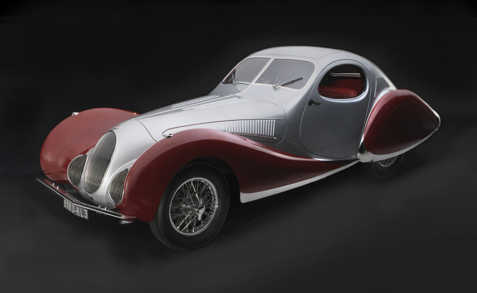 Cars, sculpture exude an uncanny sensuality in interwar France - Saint ...