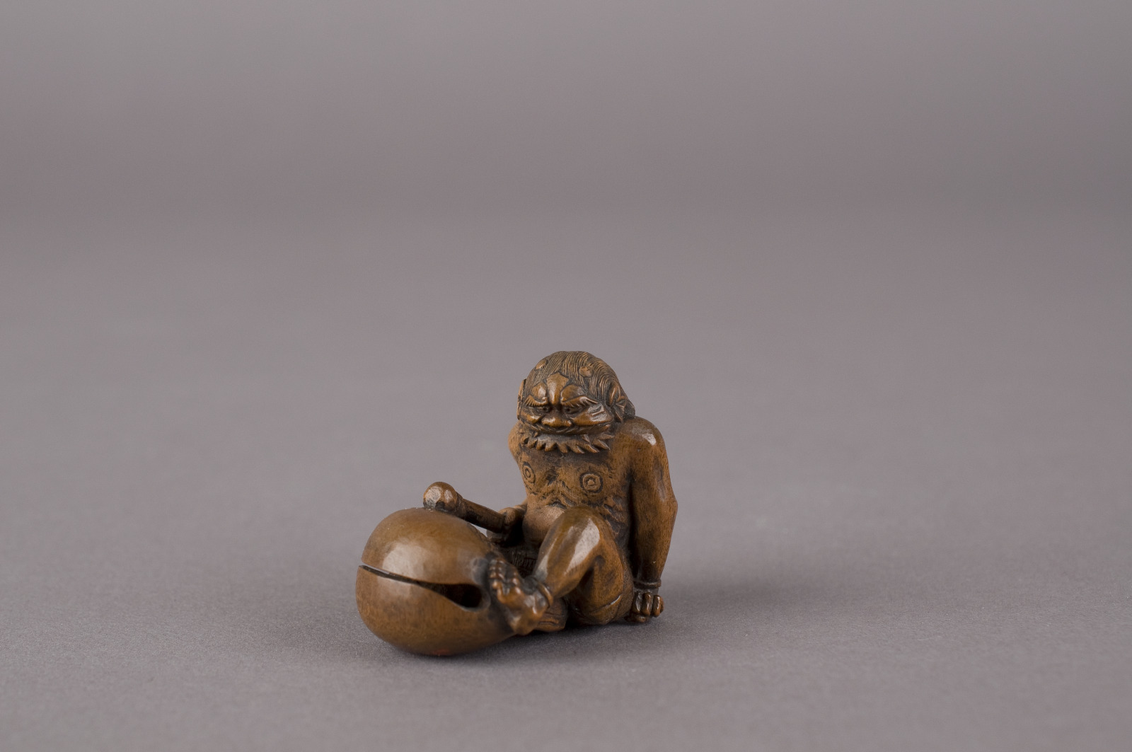 Netsuke in the Form of a Demon Striking a Bell - Saint Louis Art Museum