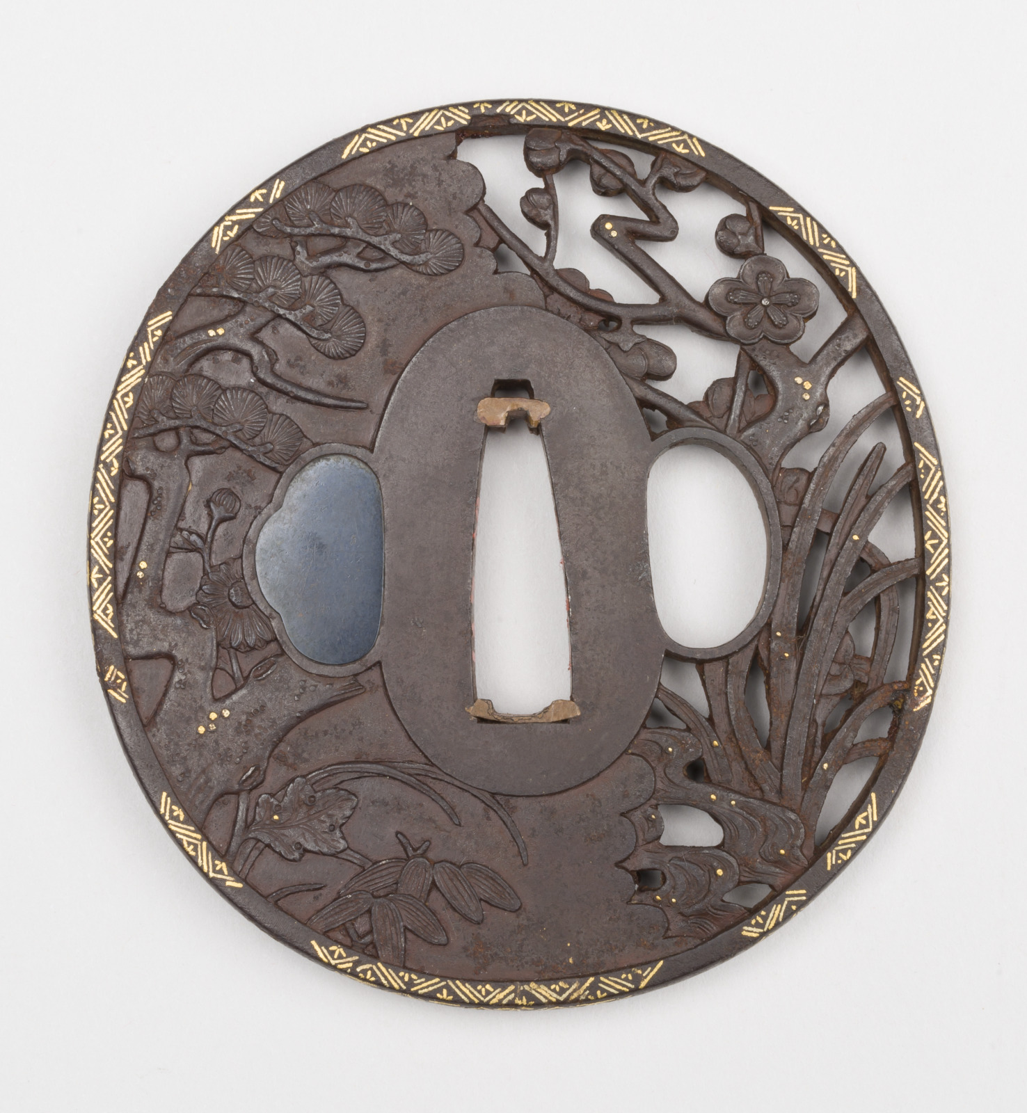 Sword Guard (tsuba) with Design of Flowers and Plants of the Four ...
